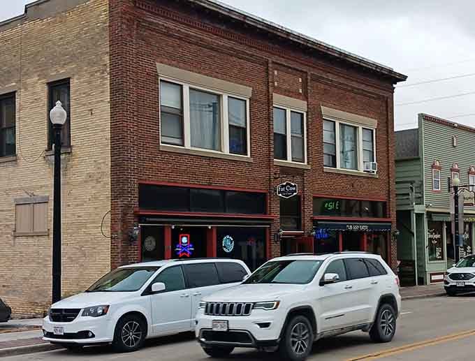 Brick facades and vintage storefronts create the kind of downtown atmosphere that chain stores simply cannot replicate.