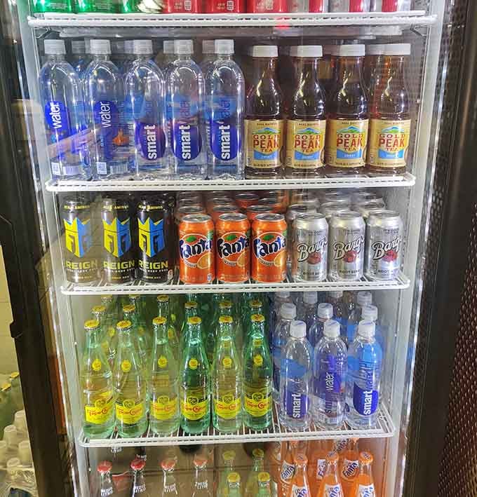 A beverage cooler stocked like your corner store from decades past, offering everything from Fanta to fancy waters.