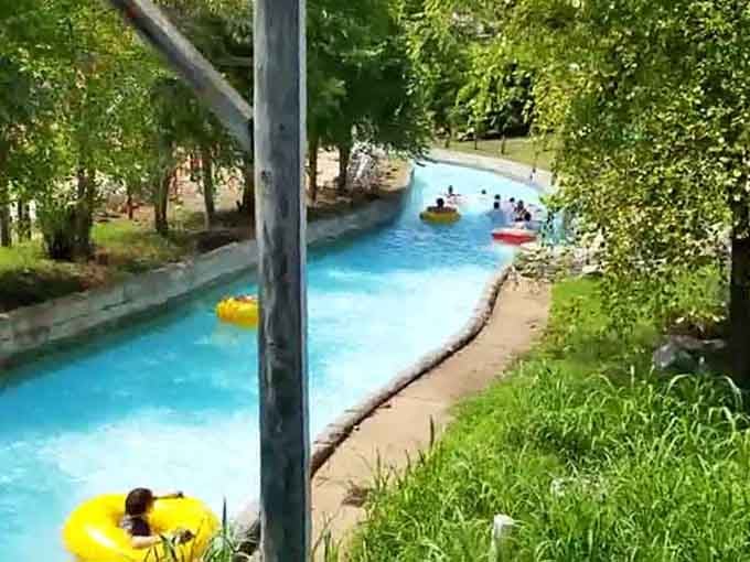 The lazy river winds through the park like a liquid highway, transporting happy floaters to a state of complete and utter relaxation.