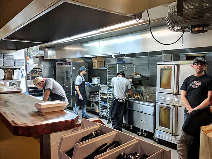 Behind every great meal stands a dedicated crew turning raw meat into smoky magic through skill and sweat.