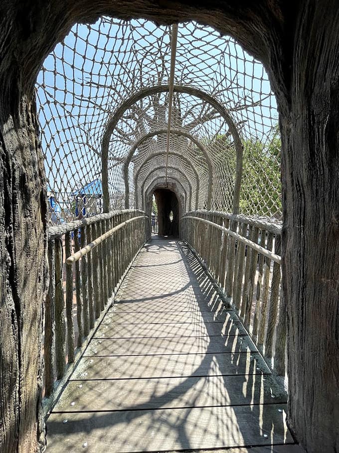This elevated walkway looks like something from a treehouse dream, except it's actually safe and city-approved somehow.