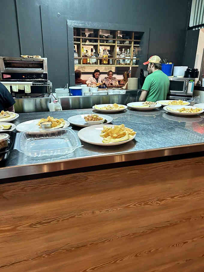 The open kitchen lets you watch the magic happen, which somehow makes everything taste even better than expected.