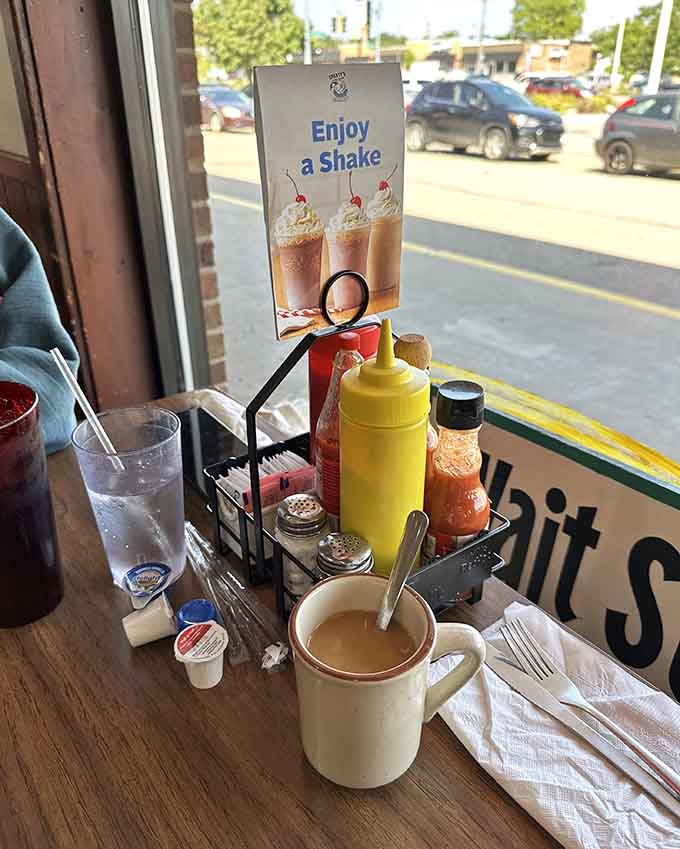 Every great diner table needs its condiment caddy, ready to customize your meal to perfection with mustard and ketchup.