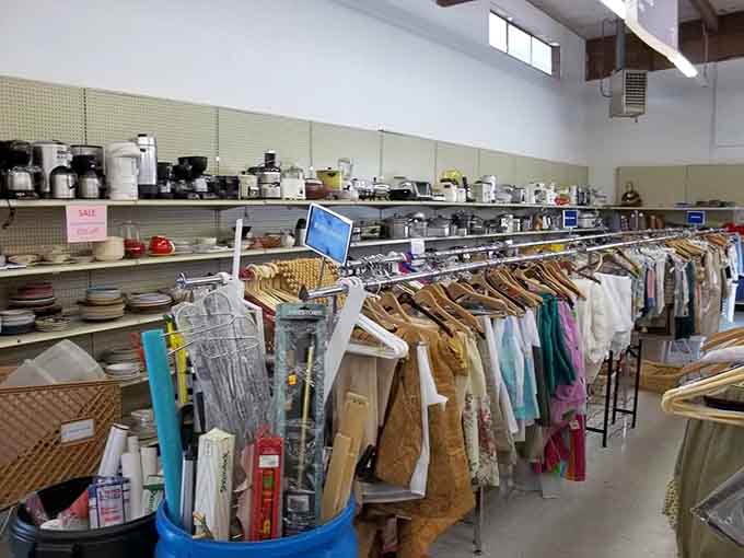 Kitchen appliances and linens share shelf space in this wonderfully eclectic housewares department.