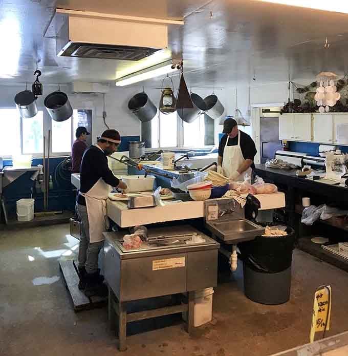 Behind-the-scenes kitchen magic where fresh seafood transforms into the kind of meals that create lifelong memories and repeat customers.