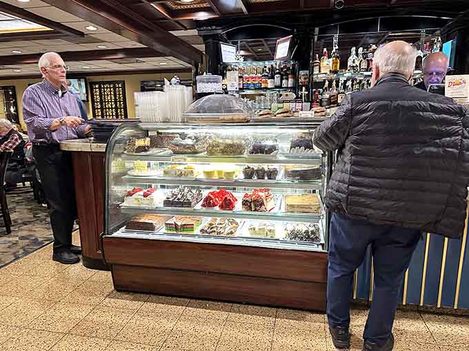 That dessert case sitting next to the bar is basically a test of willpower that most of us are destined to fail spectacularly.