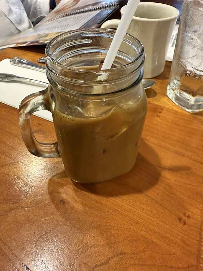 Iced latte in a mason jar, because even your coffee deserves to feel a little fancy.