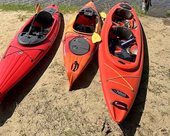 Kayaks lined up and ready to help you sneak up on fish that have seen too many boats.