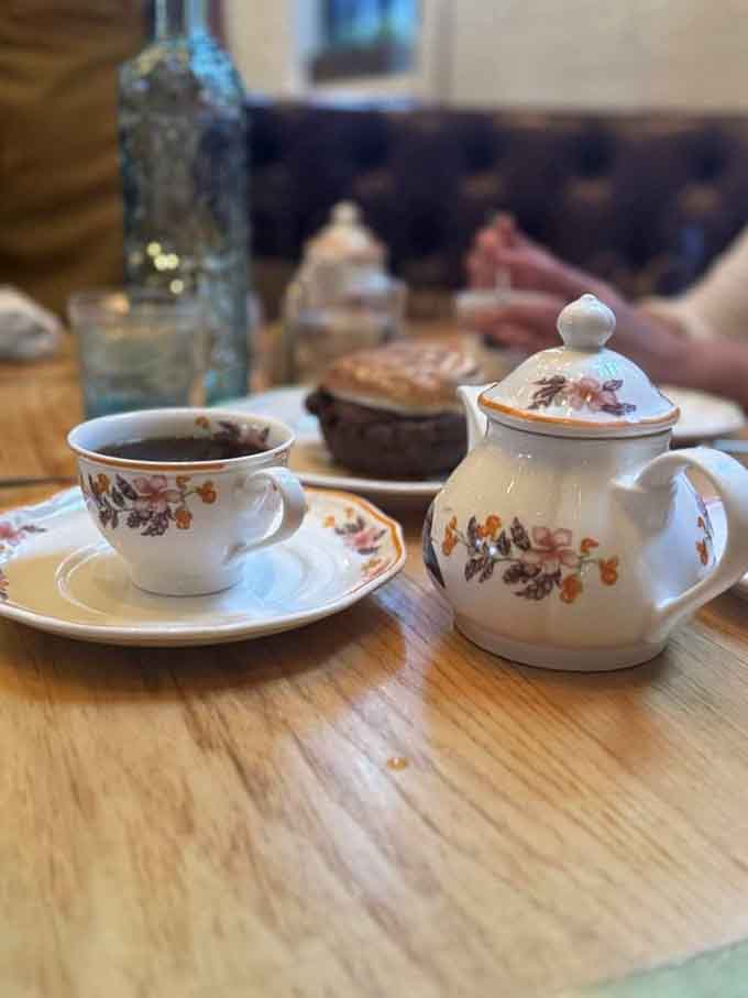 Vintage teacup and matching pot bring a touch of grandmother's elegance to your all-you-can-eat dining experience.