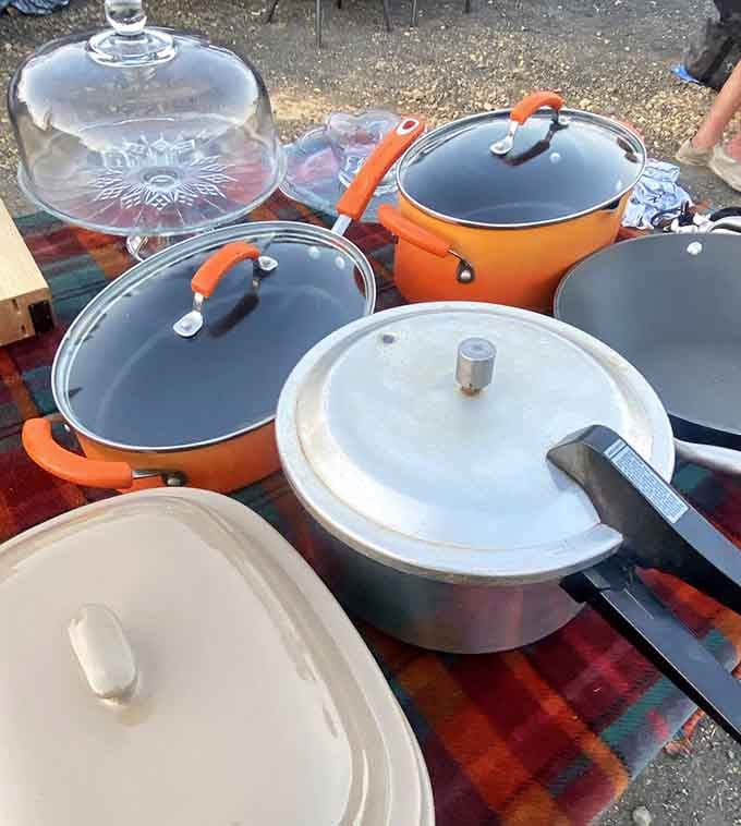 Cookware in every color imaginable, ready to make someone's kitchen look like a cooking show set.