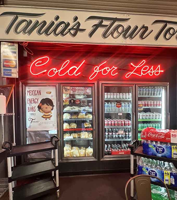 The vintage Coca-Cola cooler and neon sign add nostalgic charm while keeping your beverages perfectly chilled and ready.