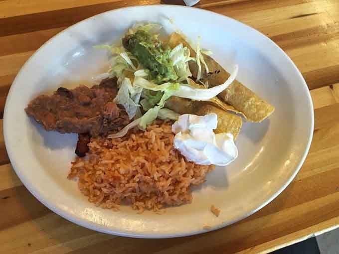 Chicken flautas with all the fixings, because sometimes you need your breakfast to come with rice and beans.