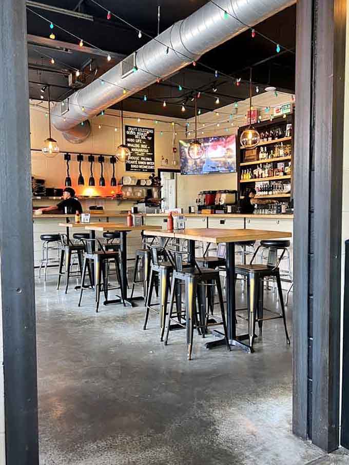 Colorful string lights and polished concrete floors create an atmosphere that's relaxed, fun, and refreshingly unpretentious throughout.