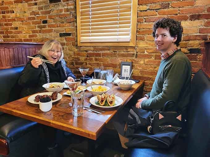 Real diners enjoying real food in a space that feels both sophisticated and genuinely welcoming to everyone who walks in.
