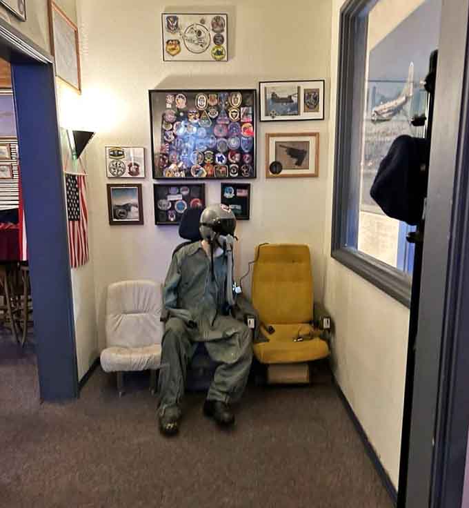Aviation memorabilia and a flight-suited mannequin create an atmosphere that's part museum, part time machine, all awesome.