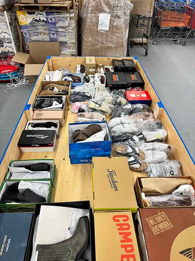 Footwear sorted into bins like a shoe lover's archaeological dig, with brand names peeking through everywhere.