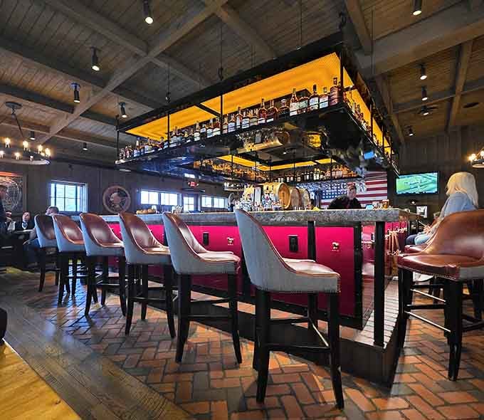 The bar area glows invitingly with brick floors and enough bottles to keep any evening interesting.
