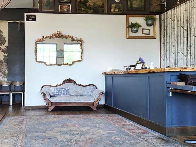 The reception area features vintage charm with that elegant settee waiting to comfort hungry breakfast seekers.