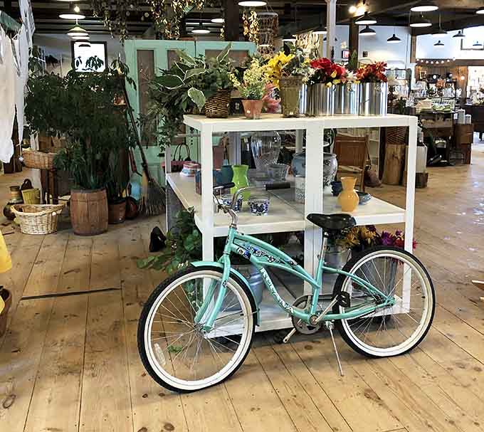 Even the display pieces have charm, like this turquoise bicycle that doubles as functional vintage art.
