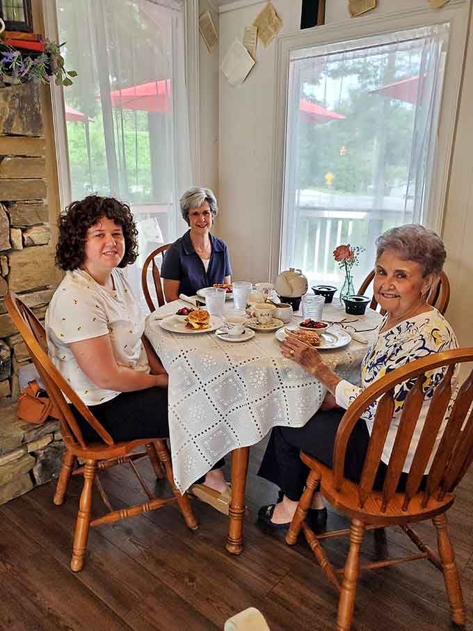 Happy diners enjoying tea time the way it was meant to be experienced, together and unhurried.