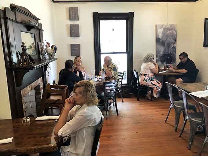 Hardwood floors and vintage decor create the kind of atmosphere where lingering over coffee feels absolutely mandatory and encouraged.