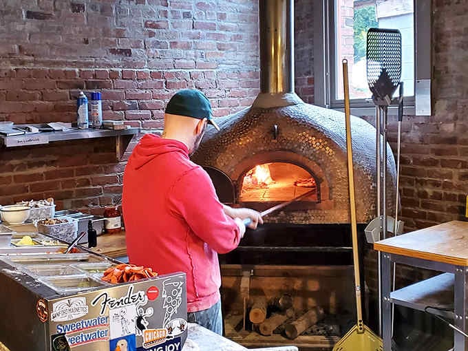 Watching pizza makers work that wood-fired oven is dinner and a show rolled into one delicious experience.