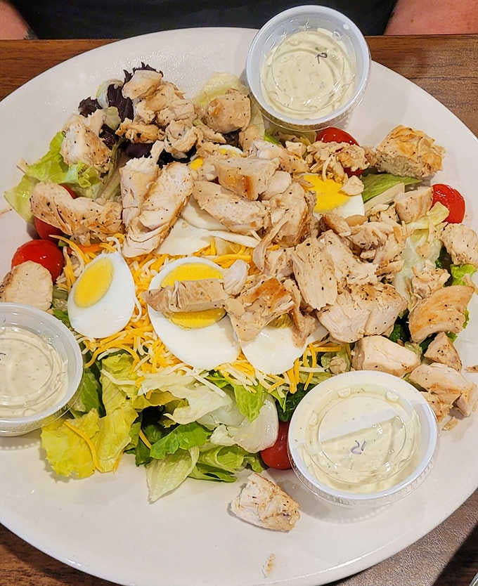 A generous chicken salad loaded with eggs and fresh vegetables&mdash;because even health-conscious choices deserve to taste incredible here.
