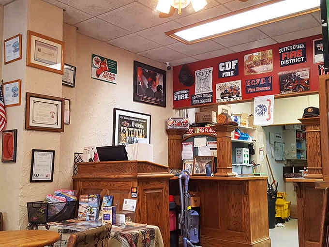 The counter area displays more firefighting history than most museums, all while serving up cold drinks and hot meals.