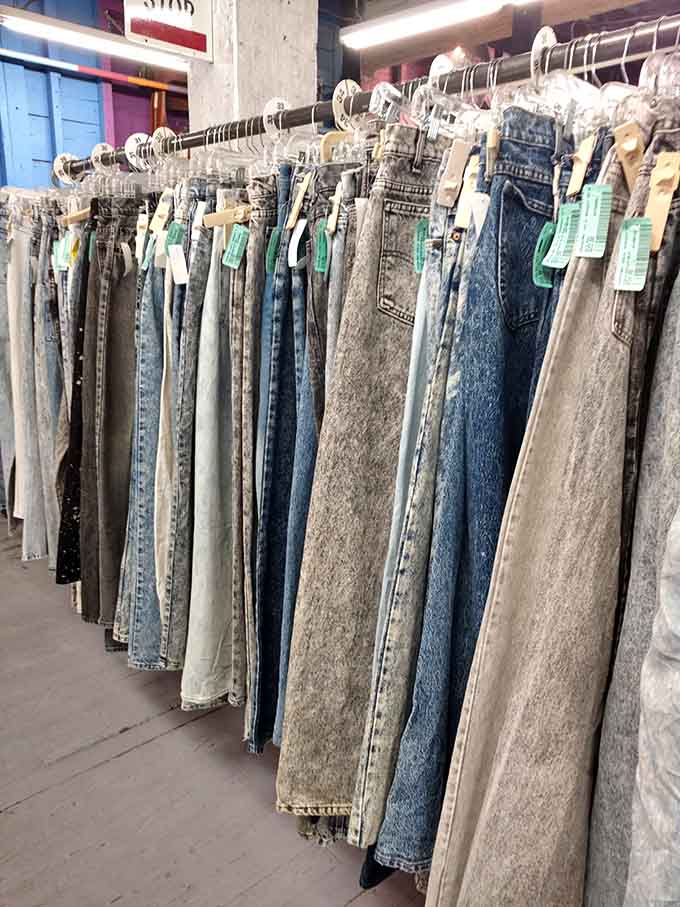 Vintage denim lined up like soldiers, each pair with its own story and perfectly broken-in character already included.