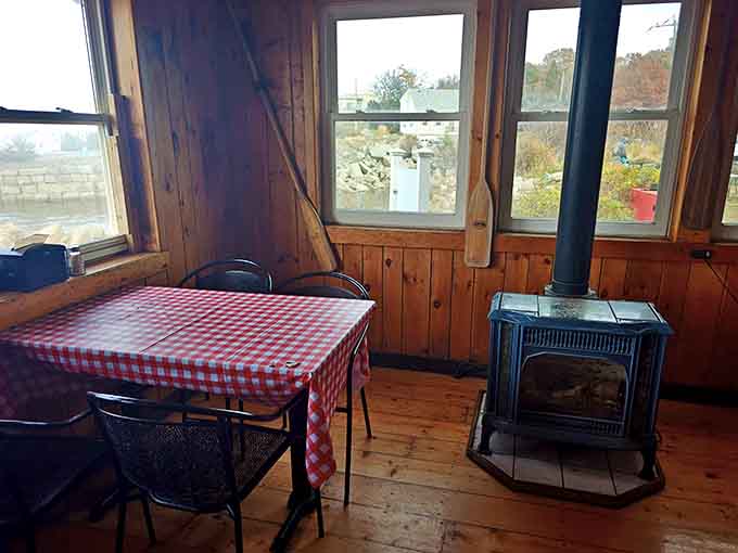 Red-and-white checkered tablecloths by the window prove that sometimes the classics work better than any trendy restaurant makeover ever could.
