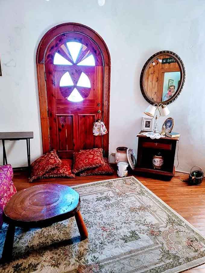 Inside, the arched doorway and cozy decor prove this place takes its fairy tale theme seriously.