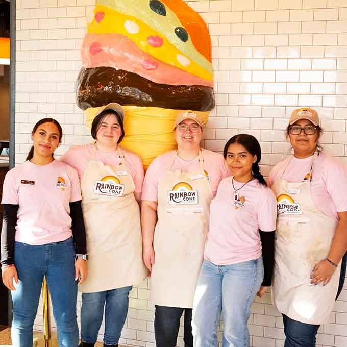 The friendly faces behind the counter, masters of the five-scoop tower and keepers of summer joy.