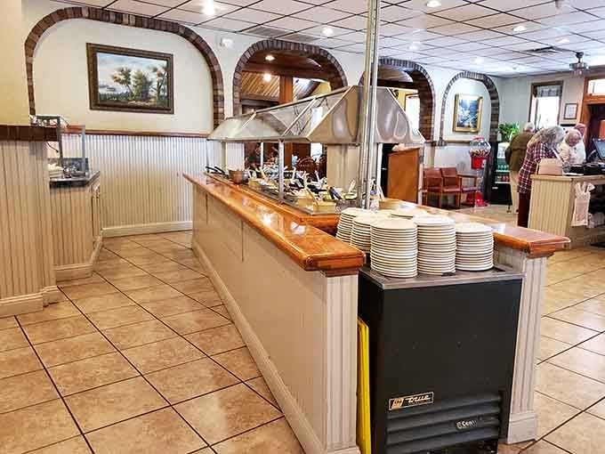 A buffet line that stretches like your stomach will in about thirty minutes, full of endless possibilities.