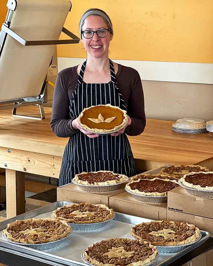 The smile of someone who knows exactly how good their pies are and isn't being modest.
