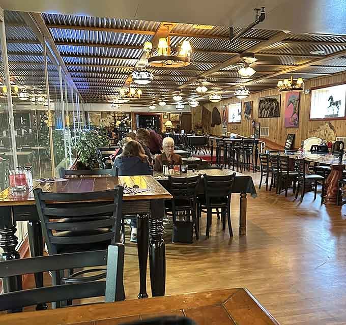 Real saddles and cowhide furniture remind you this isn't your typical restaurant, and that's exactly the point here.