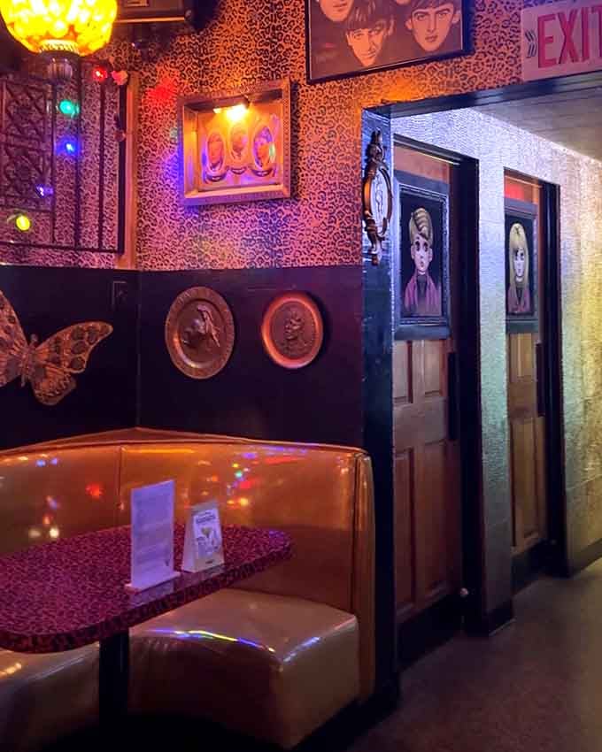 Vintage Beatles memorabilia and retro seating create intimate spaces perfect for plotting your survival strategy or just chatting.