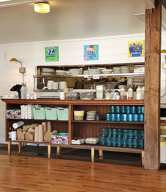 Colorful artwork and organized shelving add personality to the service area where magic happens behind the scenes.