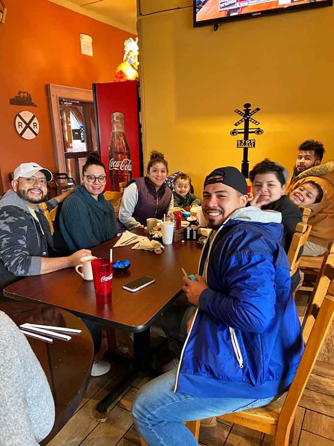 Happy faces around the table prove that good food in a historic setting creates memories worth capturing and sharing.