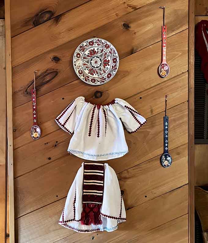 Traditional Romanian garments displayed like art remind you this place takes its cultural heritage seriously while having fun.