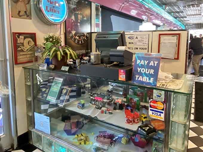 The vintage cash register and retro details at the order station make paying your bill feel like part of the experience.