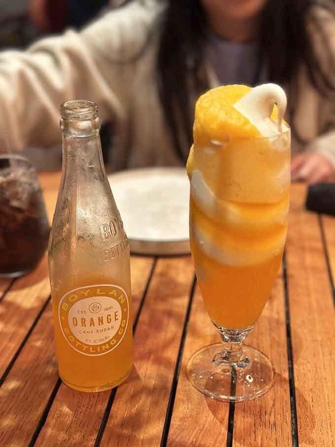 Orange creamsicle vibes in a glass that'll transport you straight back to childhood summers, but with a sophisticated adult twist.