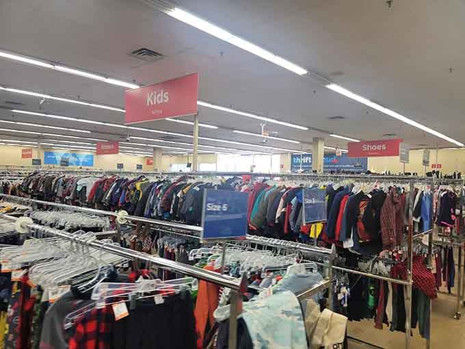 Kids' clothing organized by size, because children outgrow everything faster than you can say "growth spurt."