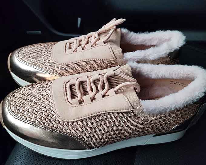 Metallic sneakers that look fresh off the runway, not someone's closet, proving pre-loved can still mean practically pristine.