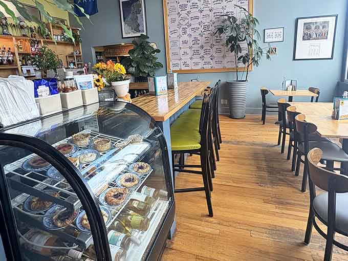 That pastry case gleams with temptation while colorful flags remind you this isn't your average Springfield spot.