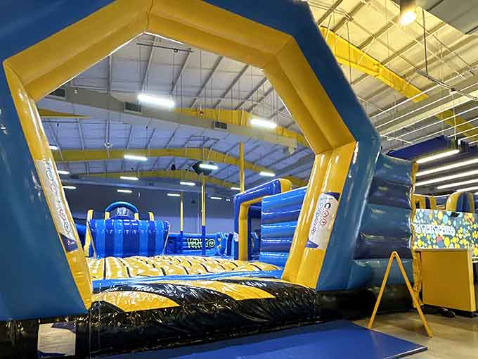 The gateway to inflatable glory beckons, where coordination goes to die and laughter comes to thrive beautifully.