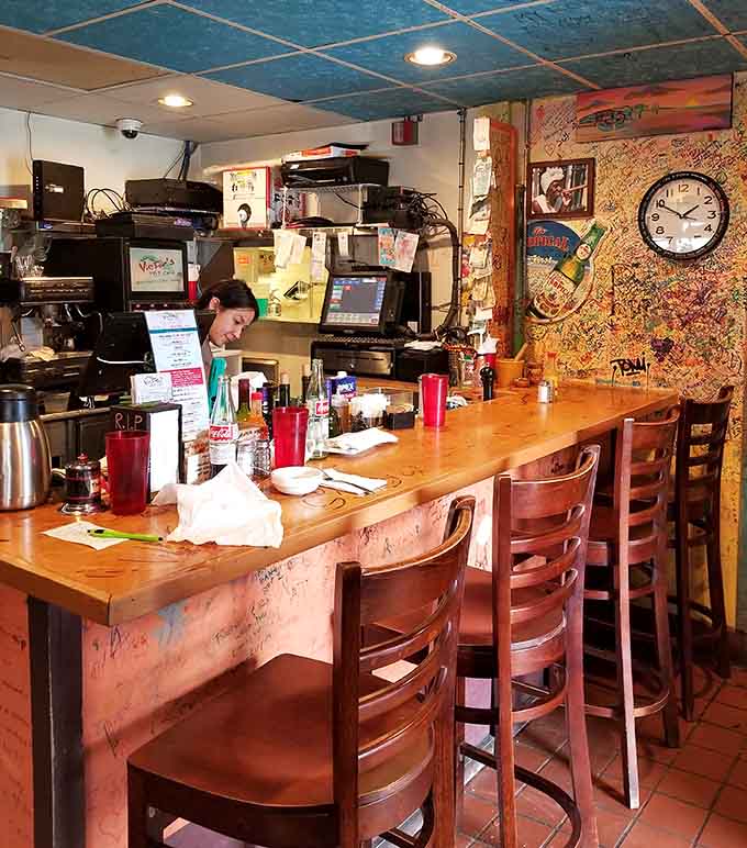 Counter seating puts you front row for the culinary show, where every dish emerges like a delicious plot twist.