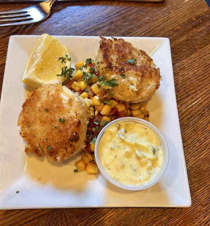 Golden-crusted crab cakes that would make any seafood lover pledge their allegiance to this tavern.