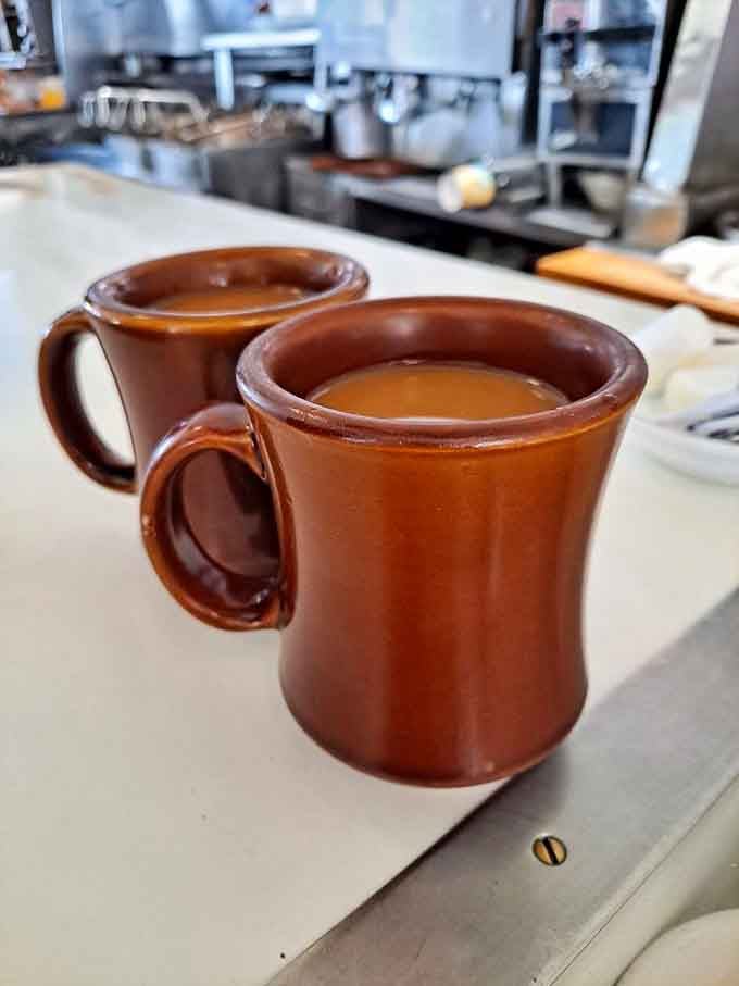 Those classic brown mugs filled with hot coffee are the fuel that powers every great diner conversation.