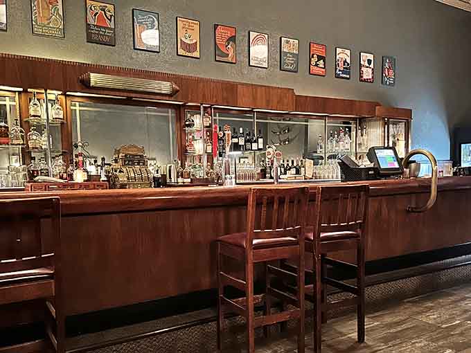The bar area features vintage charm and modern cocktails, plus that magnificent antique cash register stealing the show.