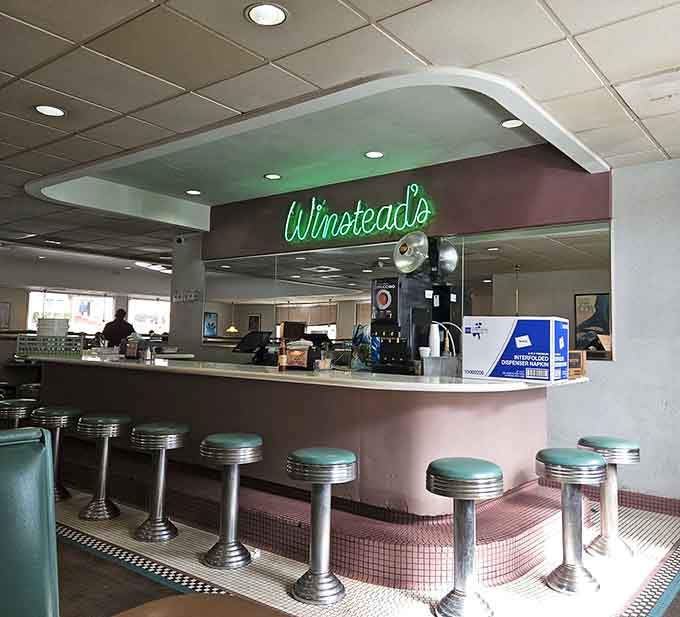 Counter seating with chrome stools where you can watch the magic happen, just like diners were meant to be experienced.